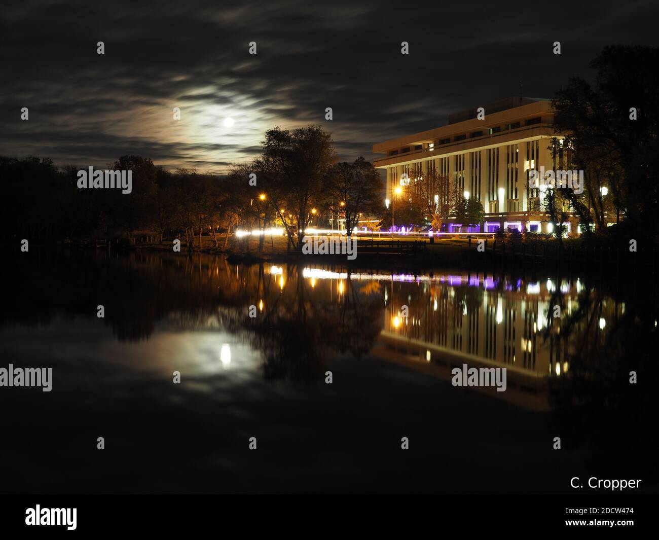 Night Landscape of full moon with building and sky reflection off the ...