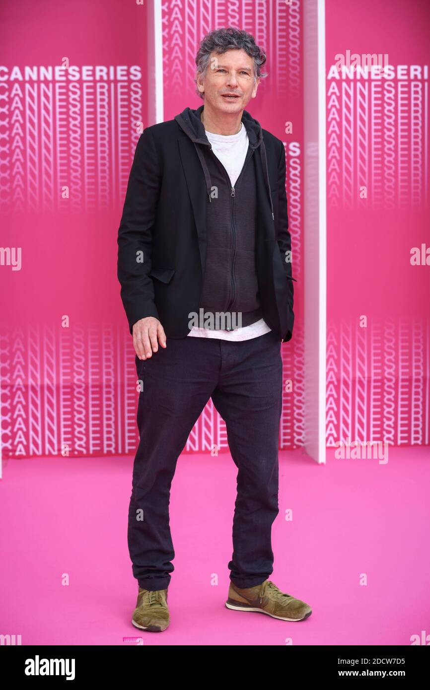 Nicolas Cuche is posing along the pink carpet for the opening ...