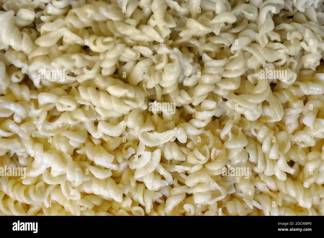 Boiled vermicelli close-up. A side dish of pastry. Background Stock ...