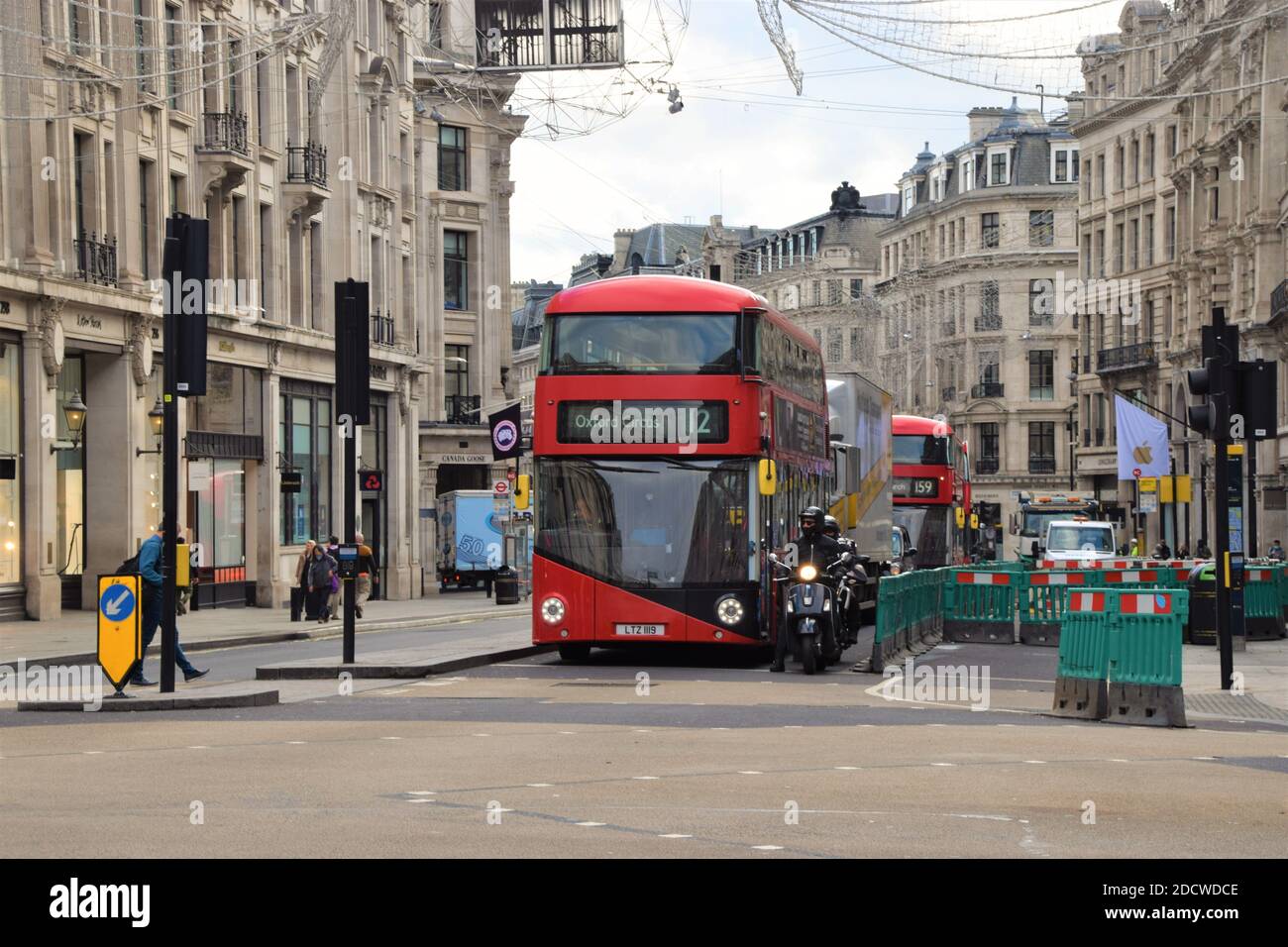 Red double-decker buses on Oxford Circus and Regent Street, daytime ...