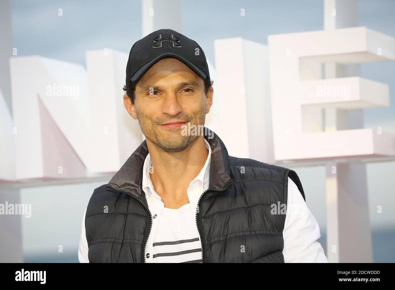 Dan Mor poses at the photocall during the 1st Cannes International ...