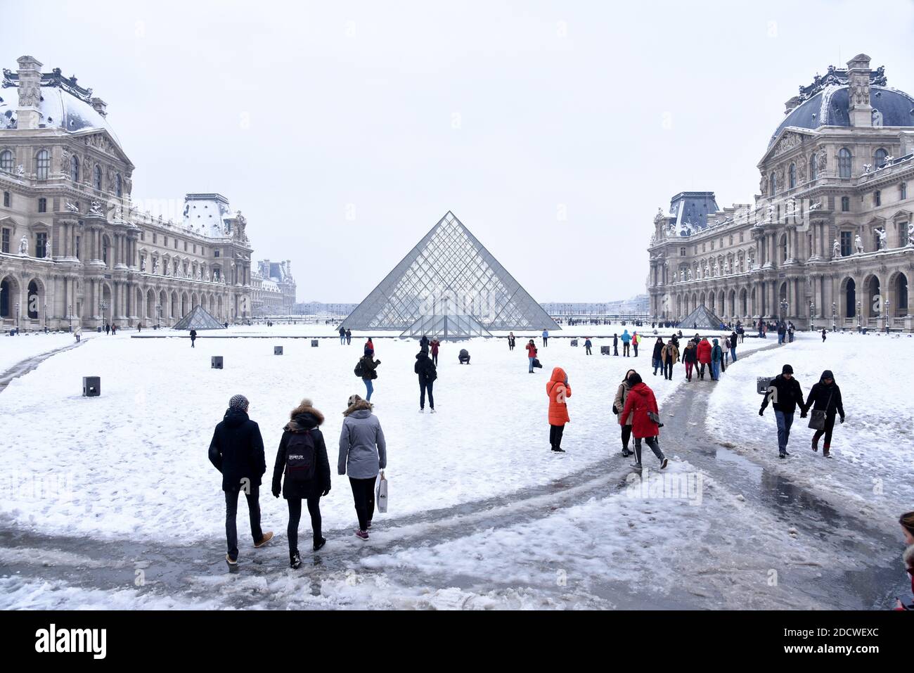 Louvre Museum Under The Snow in Paris, France on February 7, 2018 ...