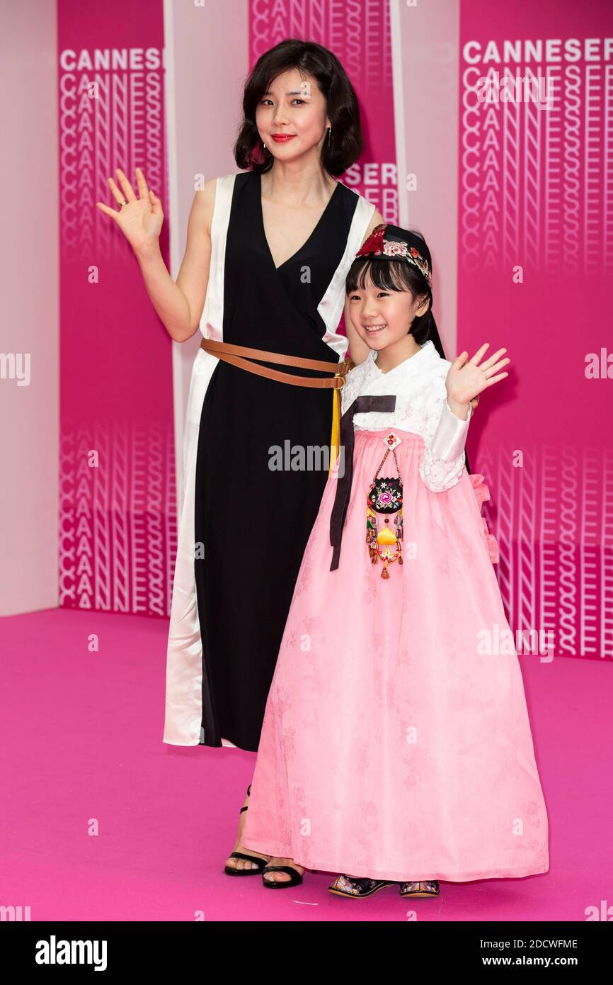 Lee Bo-Young and Heo Yool pose along the pink carpet for the opening of ...