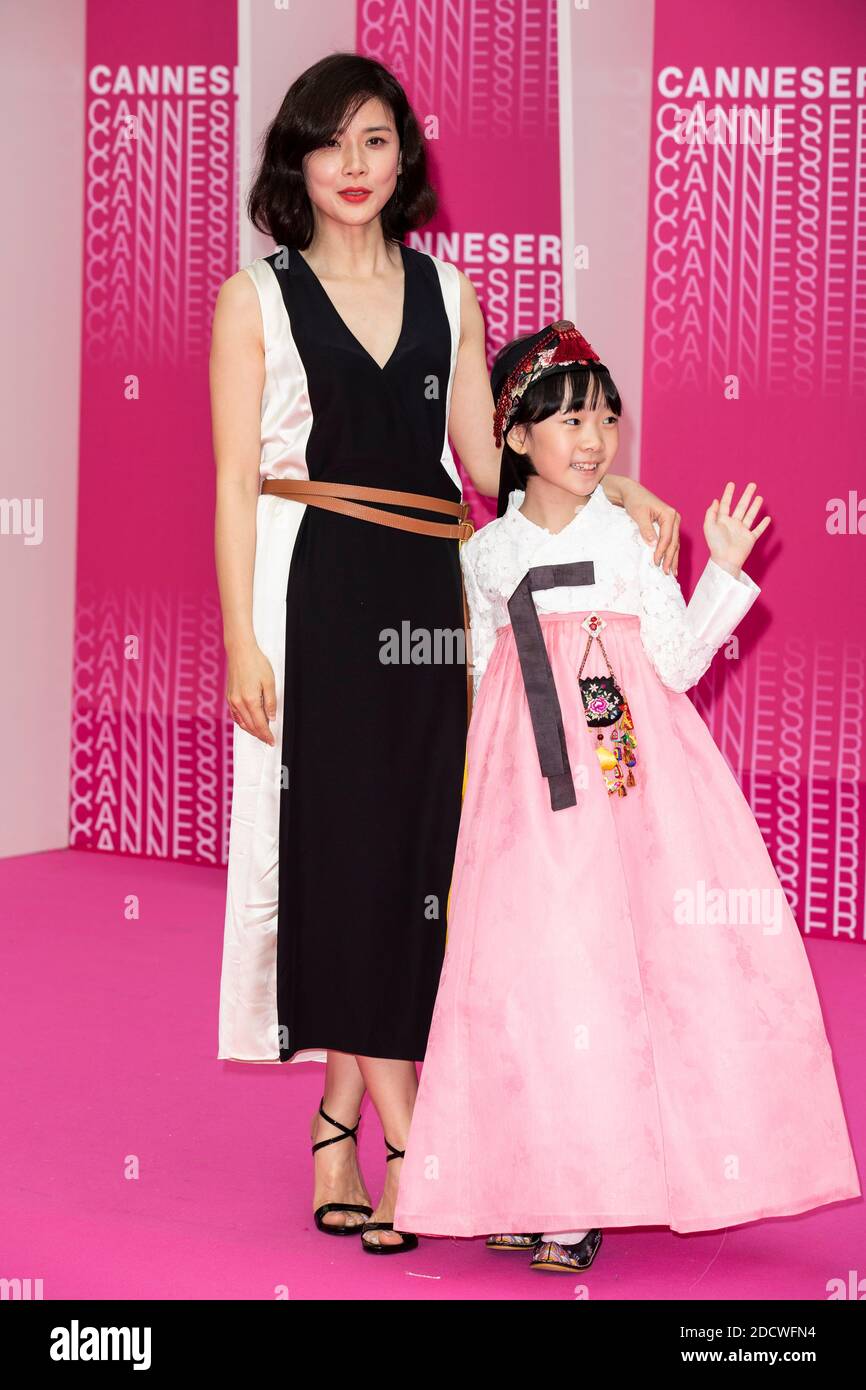 Lee Bo-Young and Heo Yool pose along the pink carpet for the opening of ...