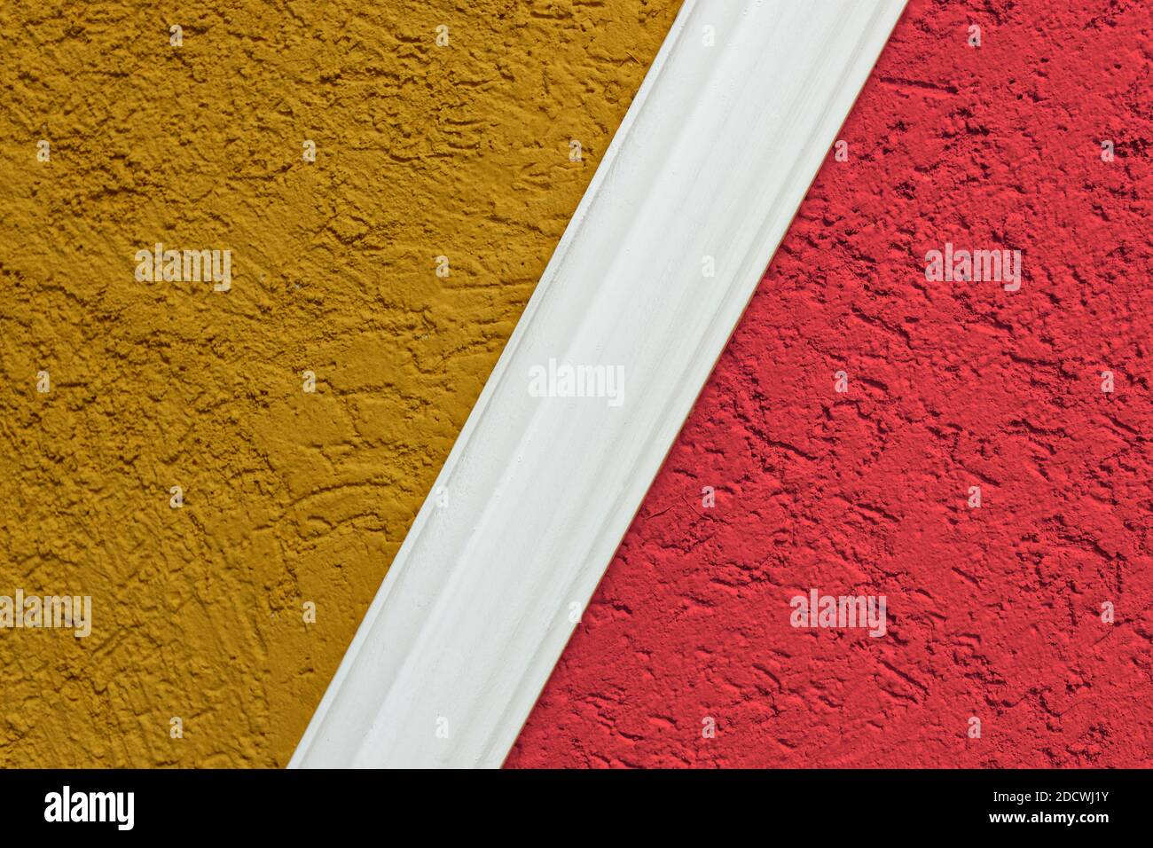 Rough plaster surface painted in a bright color. Variations of harmony ...