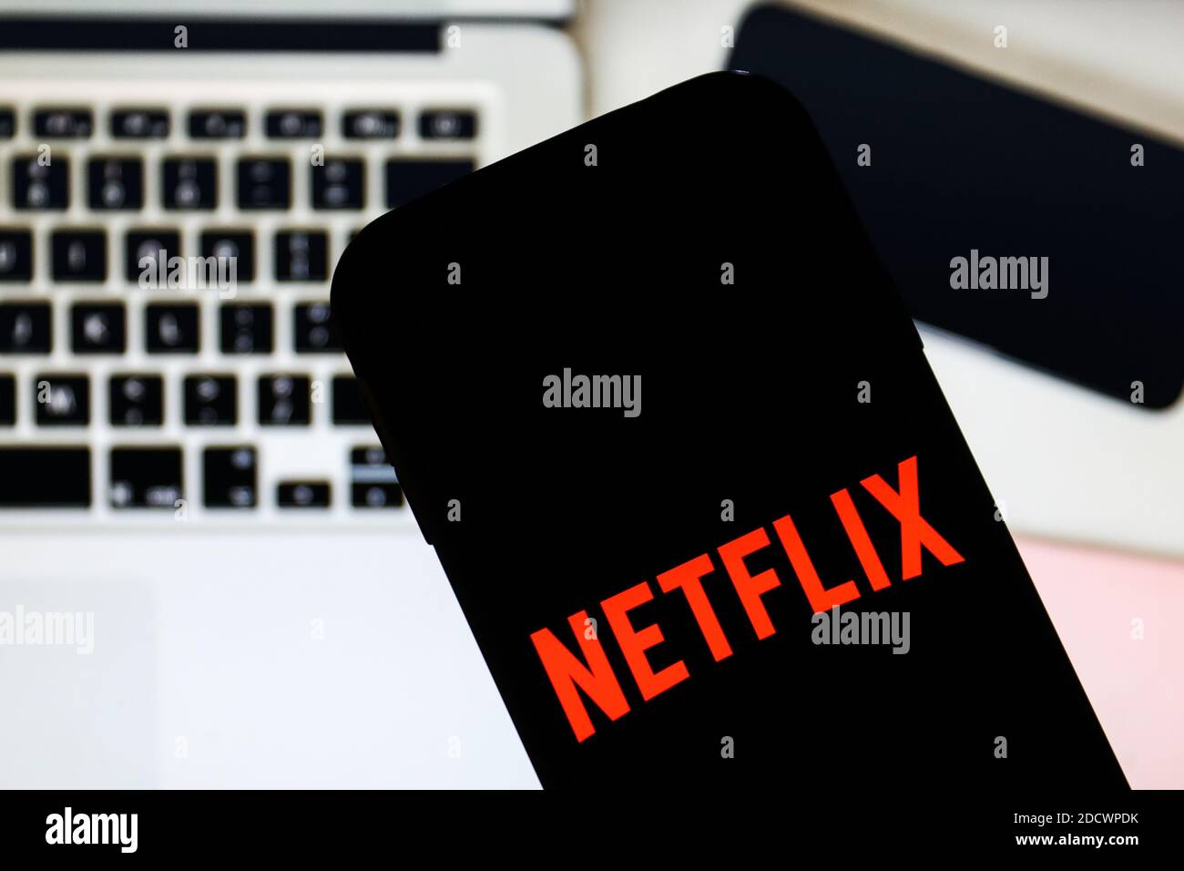 In this photo illustration a Netflix content platform logo seen ...