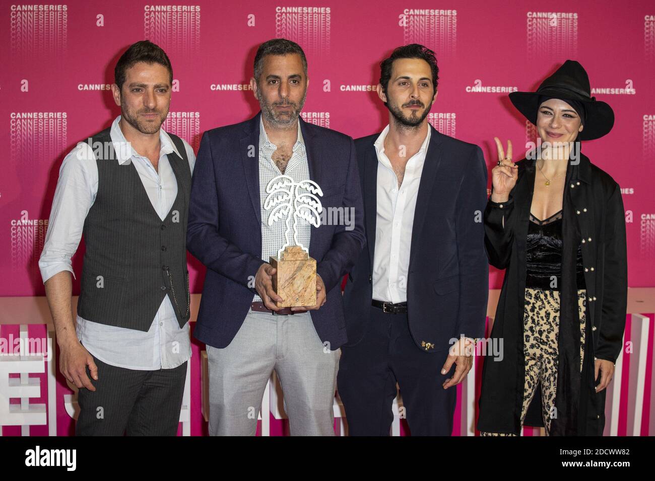 (L-R) Moshe Ashkenazi,Omri Givon,Tomer Kapon and Ninet Tayeb pose with the Best Serie Award from ...