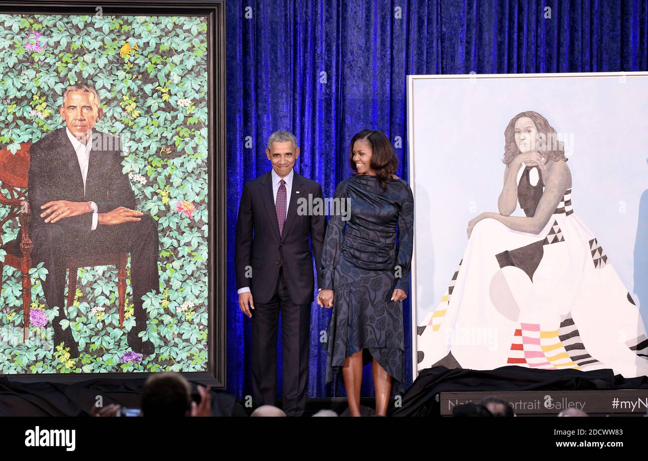 Former First Lady Michelle Obama and former President Barack Obama pose ...
