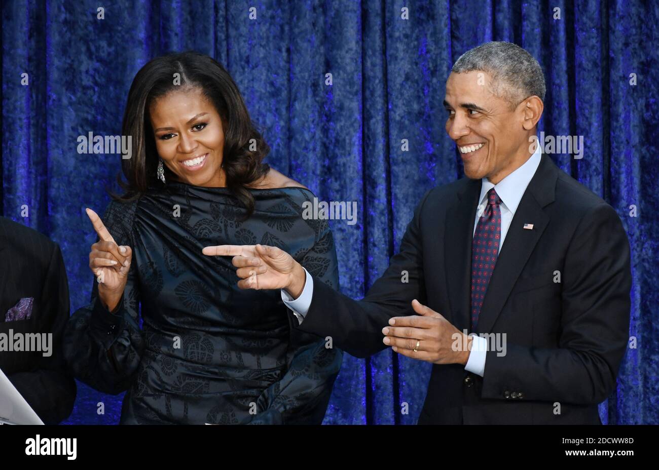 Former President Barack Obama and First Lady Michelle Obama attend the ...