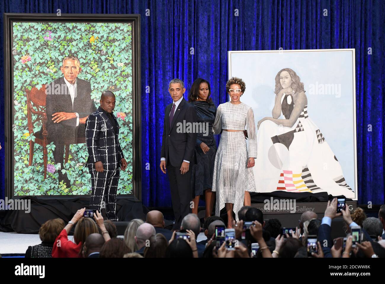 Former First Lady Michelle Obama and former President Barack Obama pose ...