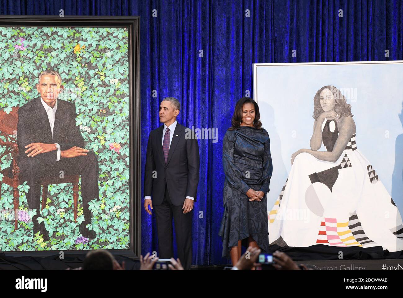 Former President Barack Obama and First Lady Michelle Obama pose next ...