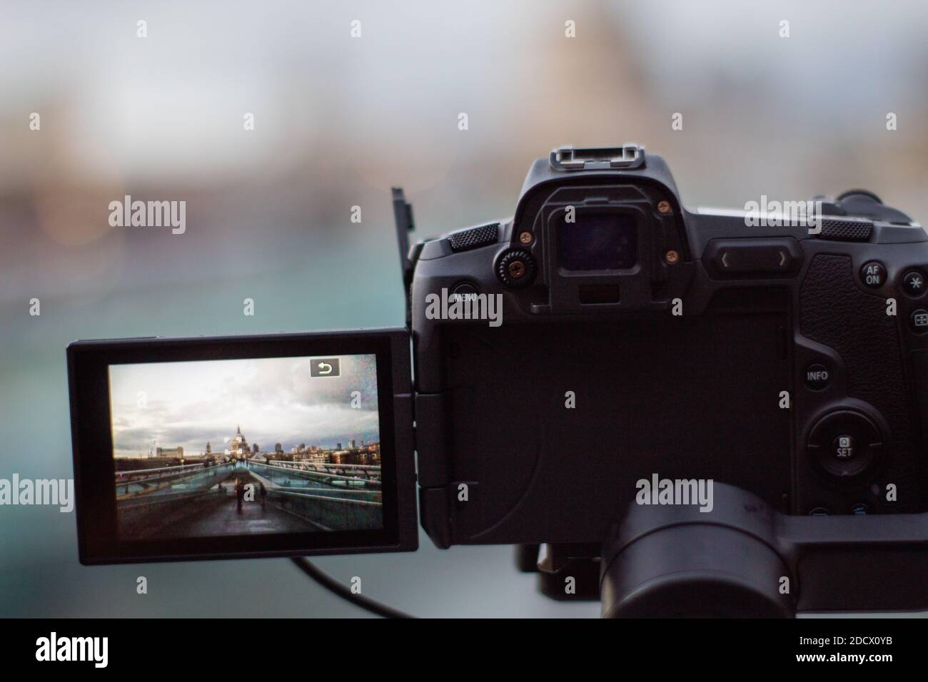 Camera recording the Millennium Bridge ramp and St Paul Cathedral Stock ...