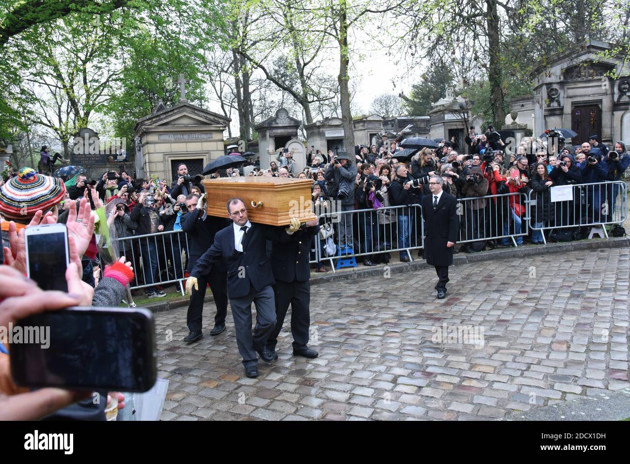 Izia Higelin, Arthur H, Ken Higelin during the funeral of Jacques ...