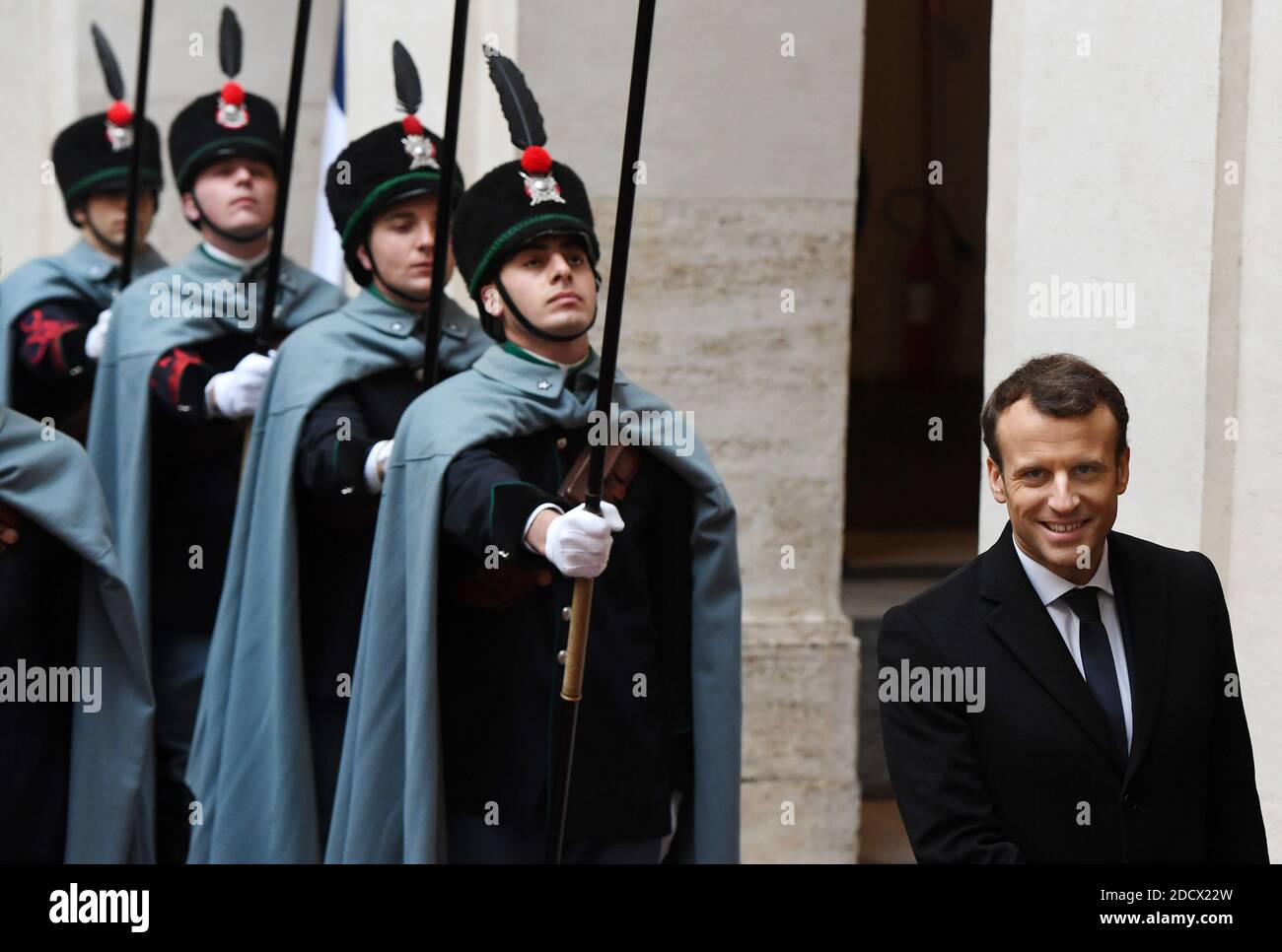 France's President Emmanuel Macron arrives at the Palazzo Chigi before ...