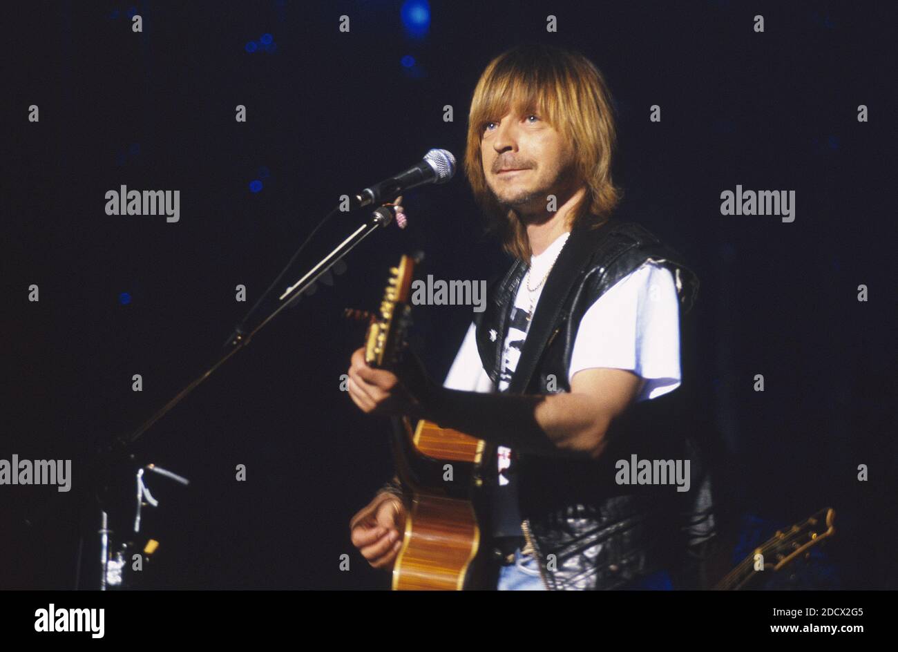 French singer and songwriter Renaud performs live on the stage in 80's ...