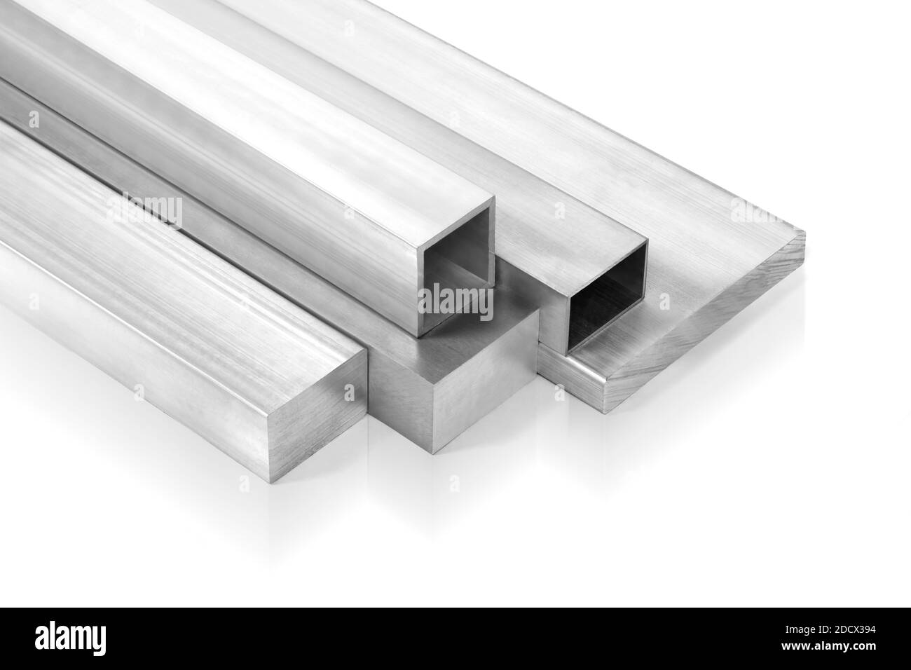 Aluminium bars stacked on white background . Aluminum rods Stock Photo ...