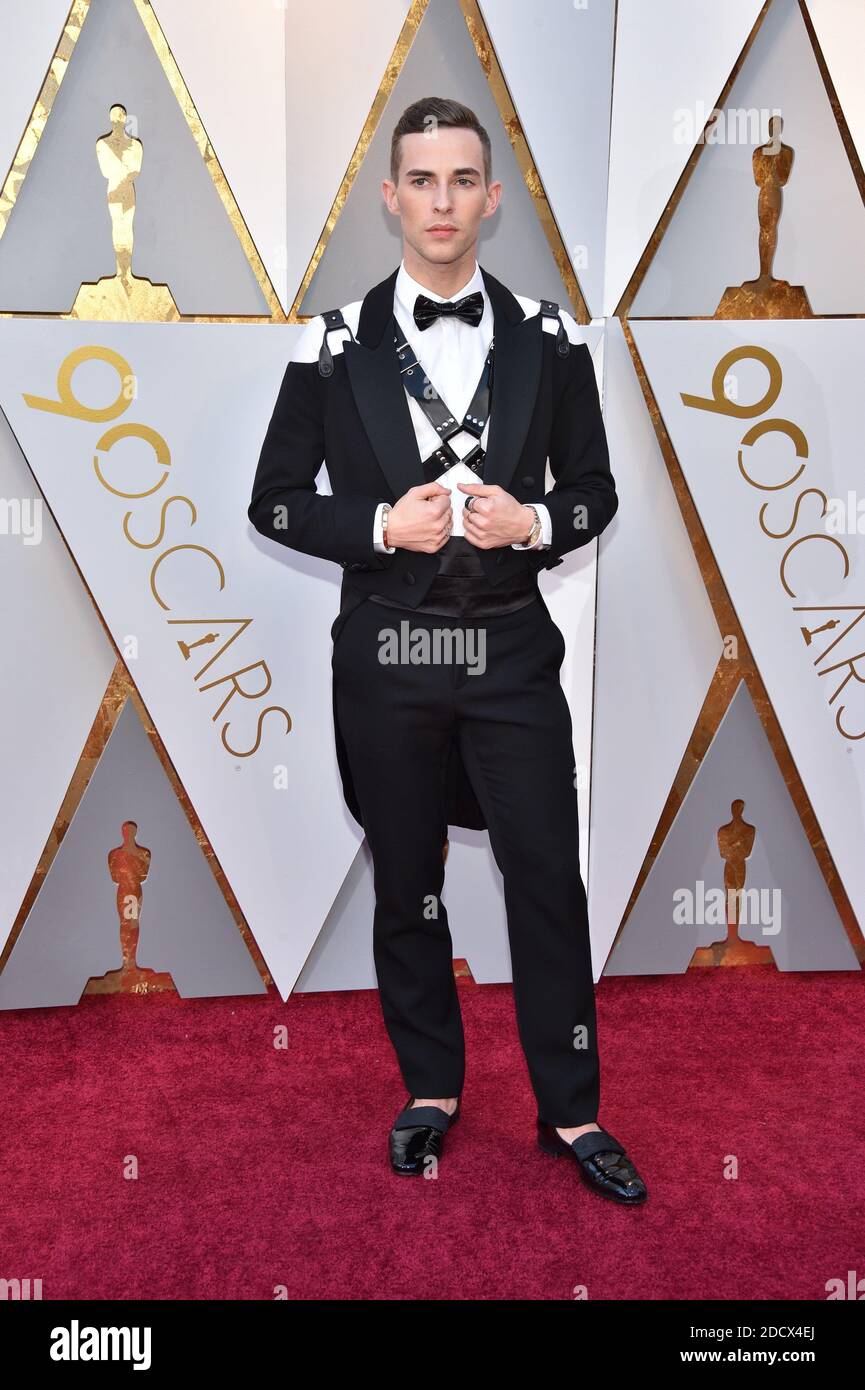 Olympic medalist Adam Rippon walks the red carpet as arriving to the ...