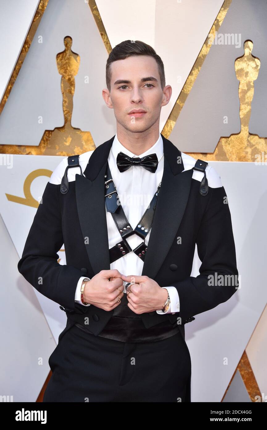 Olympic medalist Adam Rippon walks the red carpet as arriving to the ...