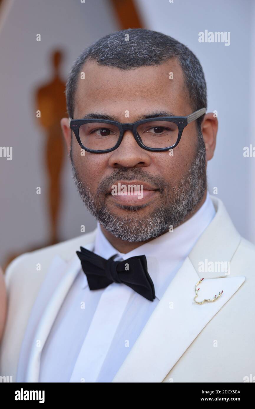 Jordan Peele walking the red carpet as arriving to the 90th annual ...