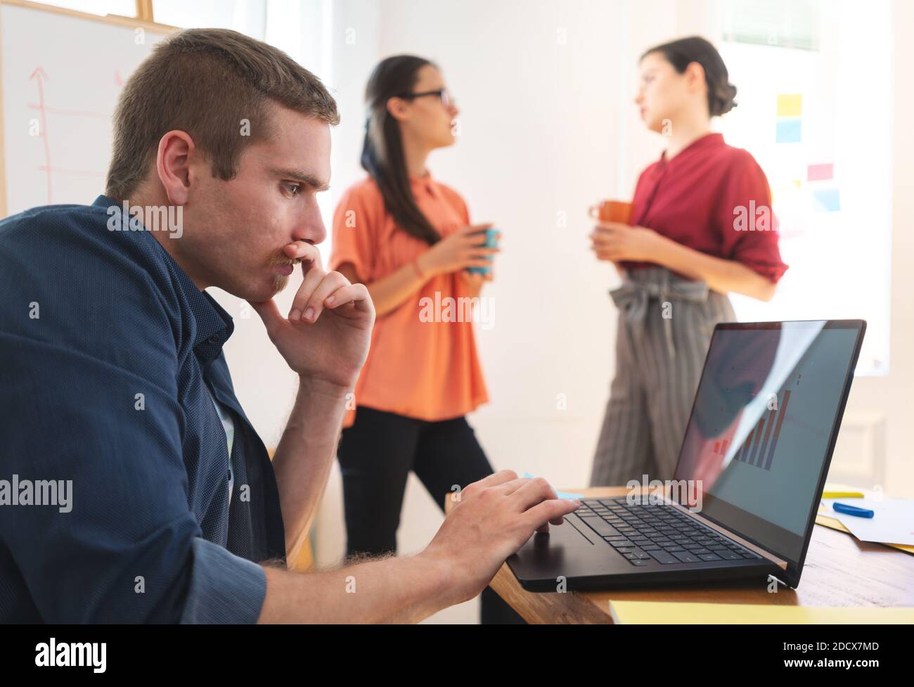 Corporate colleague laptop graph hi-res stock photography and images ...