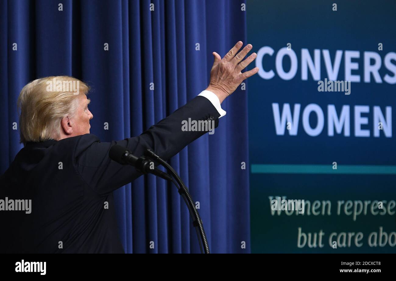 U.S. President Donald Trump waves after speaking at the "Conversations ...