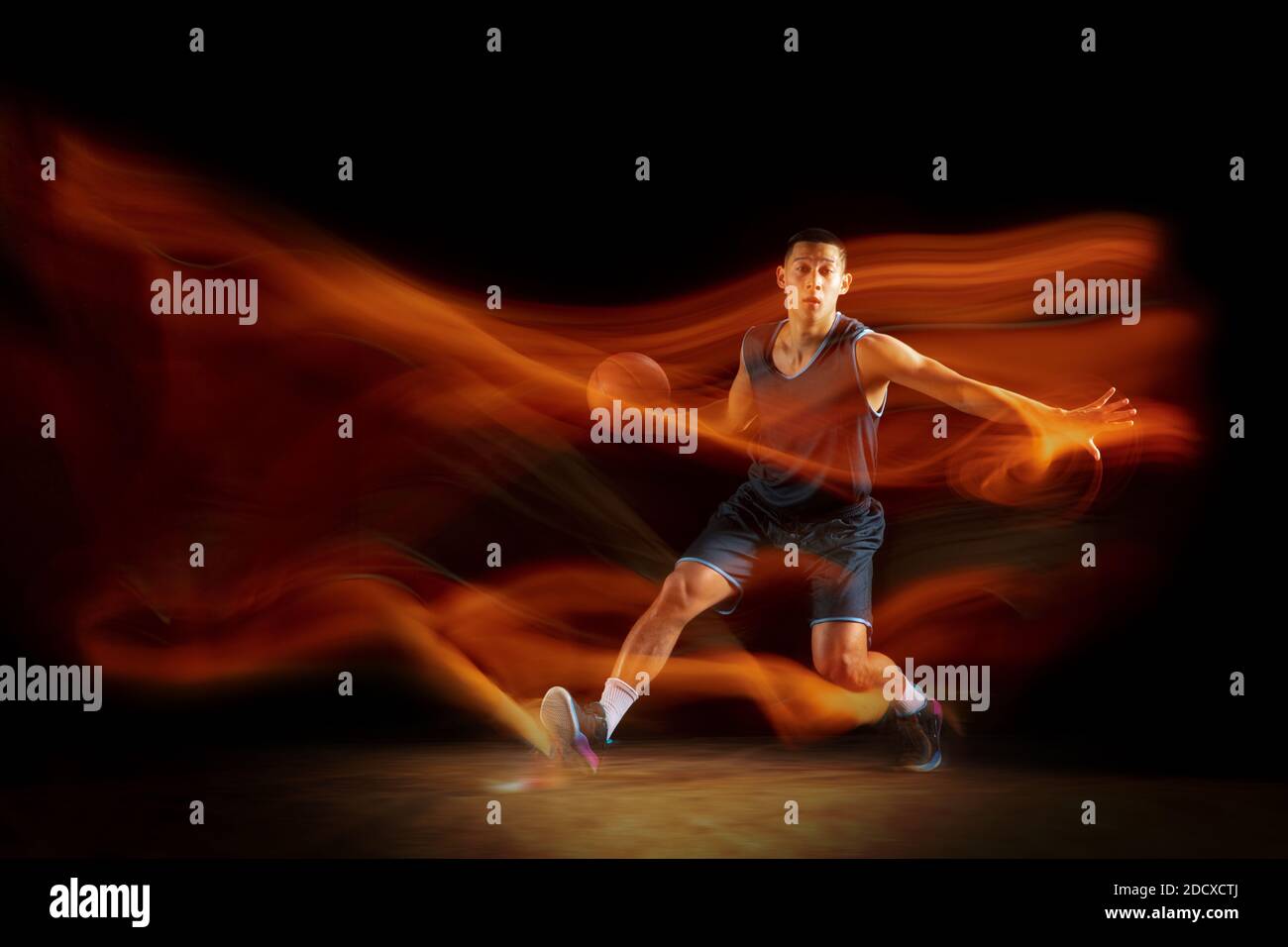 Movement. Young east asian basketball player in action and motion ...
