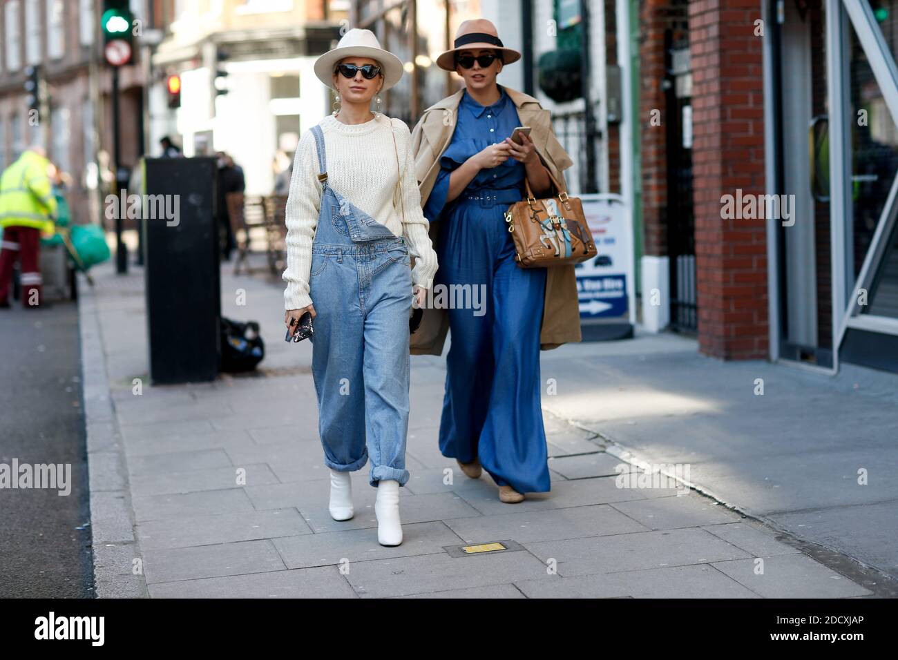 Street style, Deea Codrea and Manuela Lupascu arriving at JW Anderson ...
