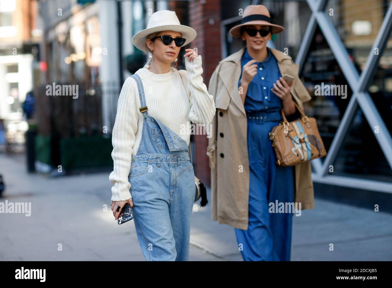 Street style, Deea Codrea and Manuela Lupascu arriving at JW Anderson ...