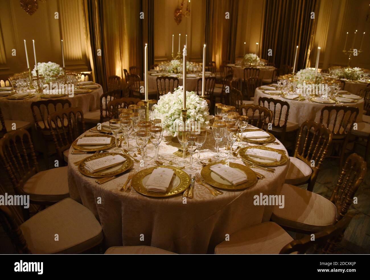 A sample place setting and menu are seen during a press preview of a ...