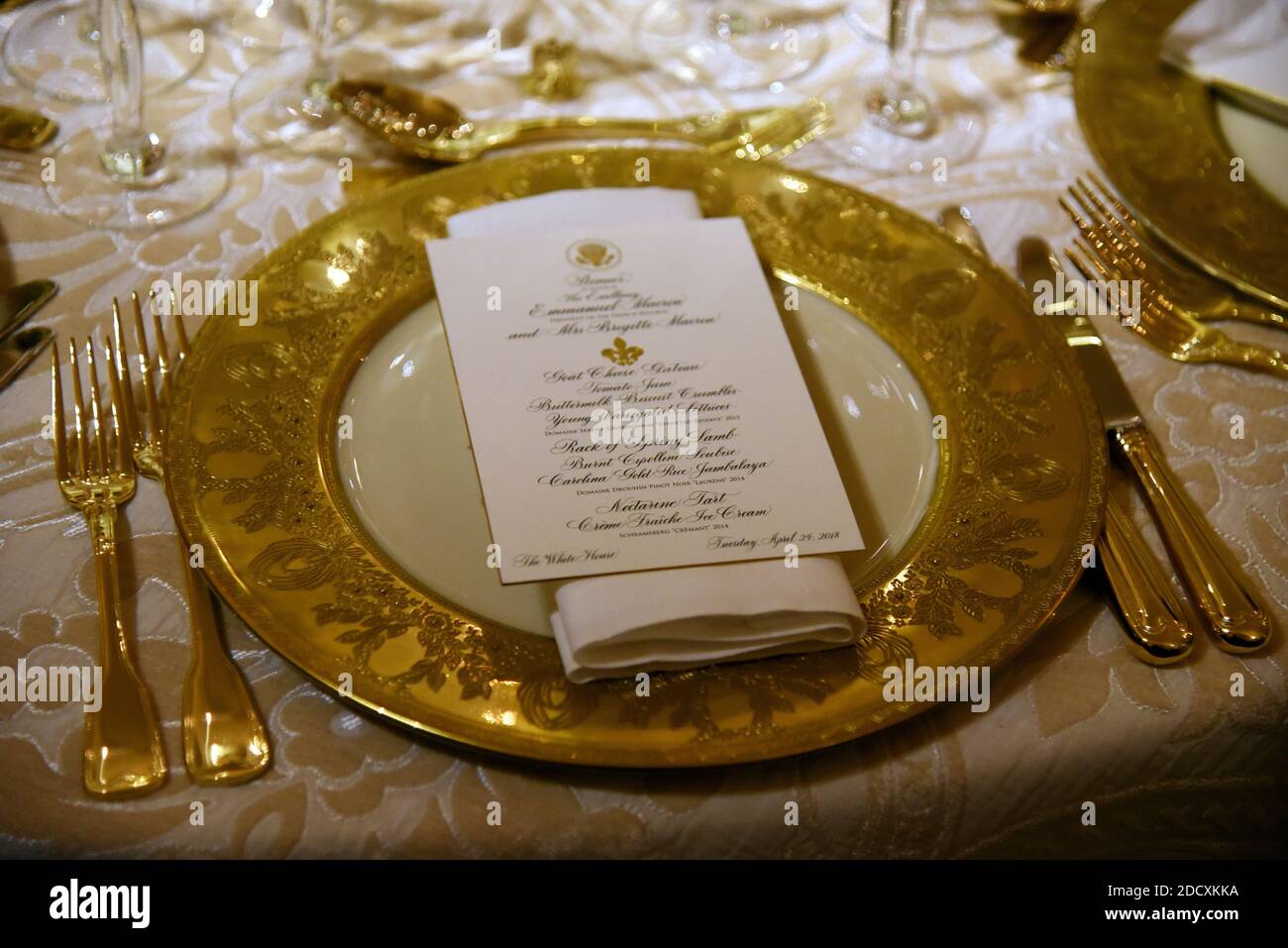 A sample place setting and menu are seen during a press preview of a ...