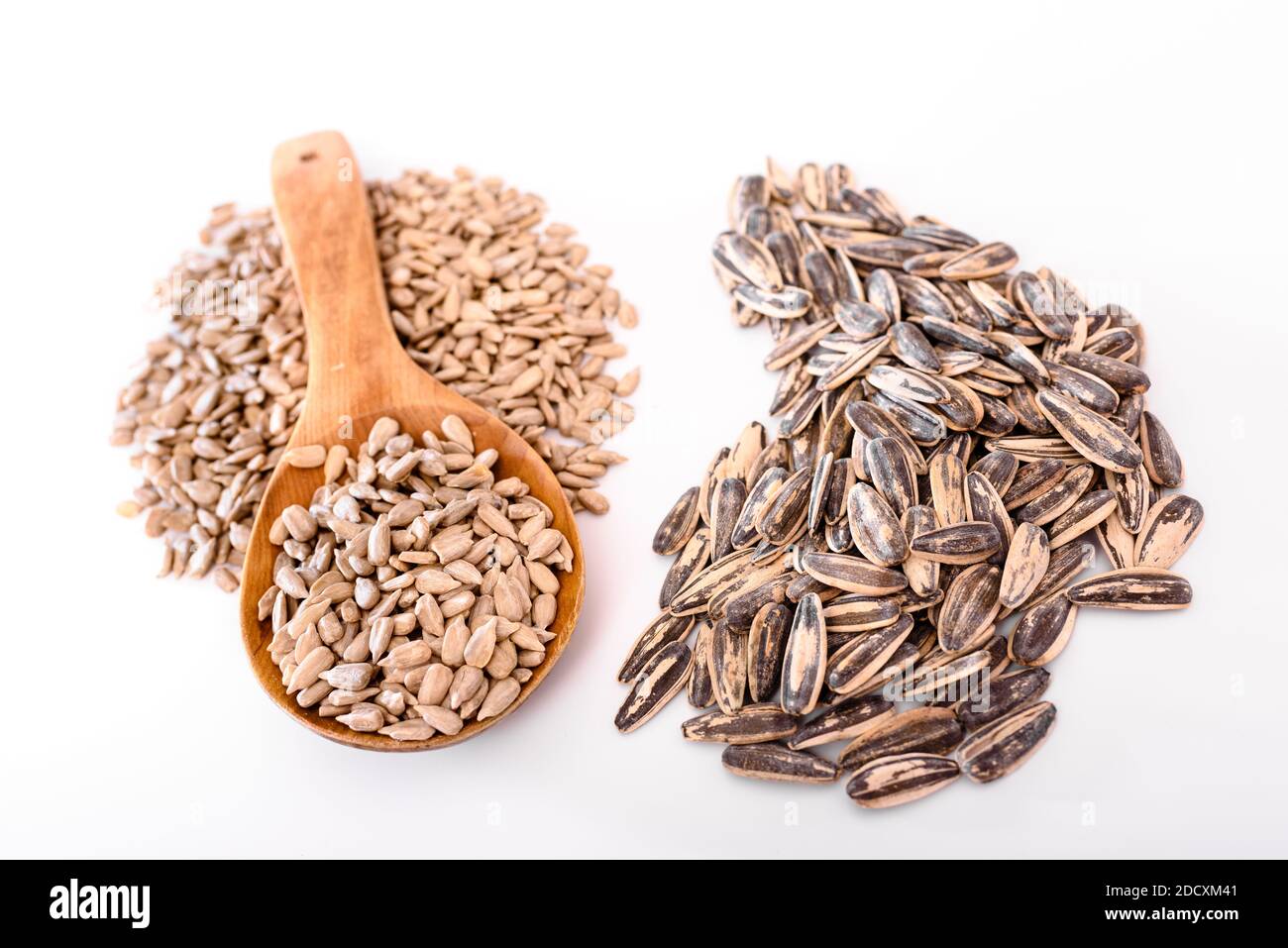 Peeled and unpeeled sunflower seeds, nutritious food but high in fat ...