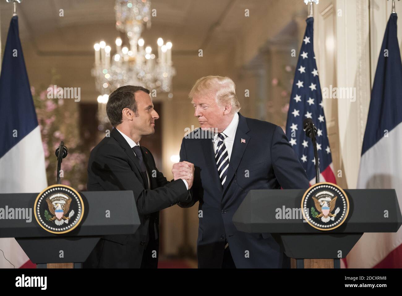French President Emmanuel Macron and US President Donald Trump shakes ...
