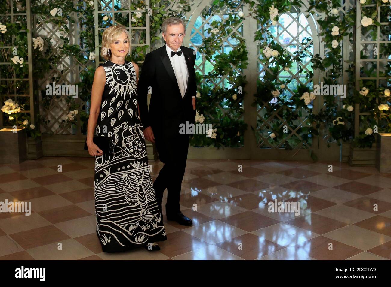 Bernard Arnault and Hélène Arnault arrives in the “Booksellers Area” of ...
