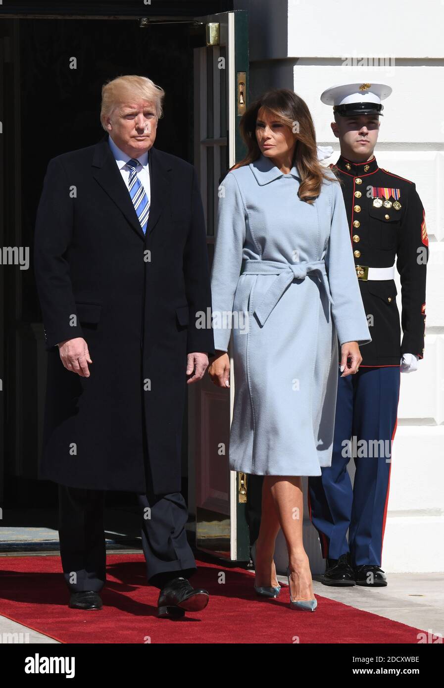 US President Donald Trump and First Lady Melania Trump arrive to greet ...