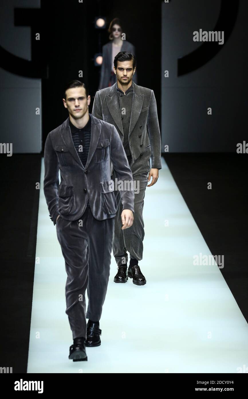 A model takes the runaway during the fashion show of Giorgio Armani ...