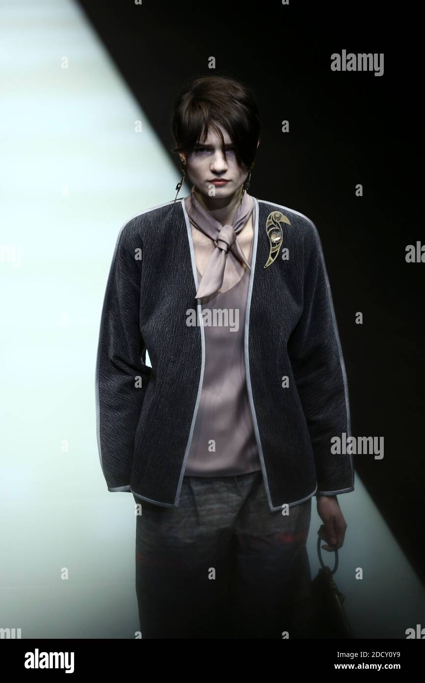 A model takes the runaway during the fashion show of Giorgio Armani ...