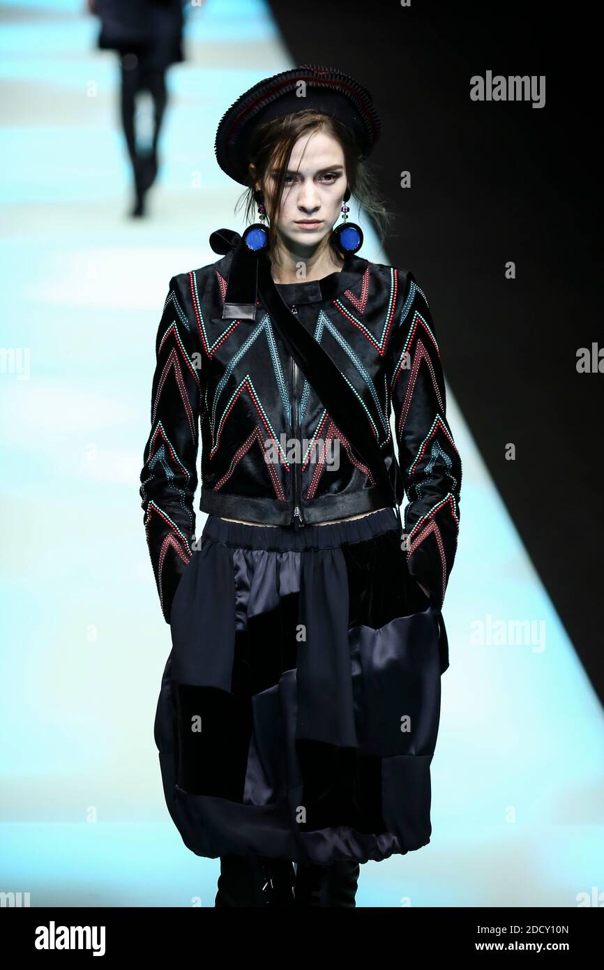 A model takes the runaway during the fashion show of Giorgio Armani ...