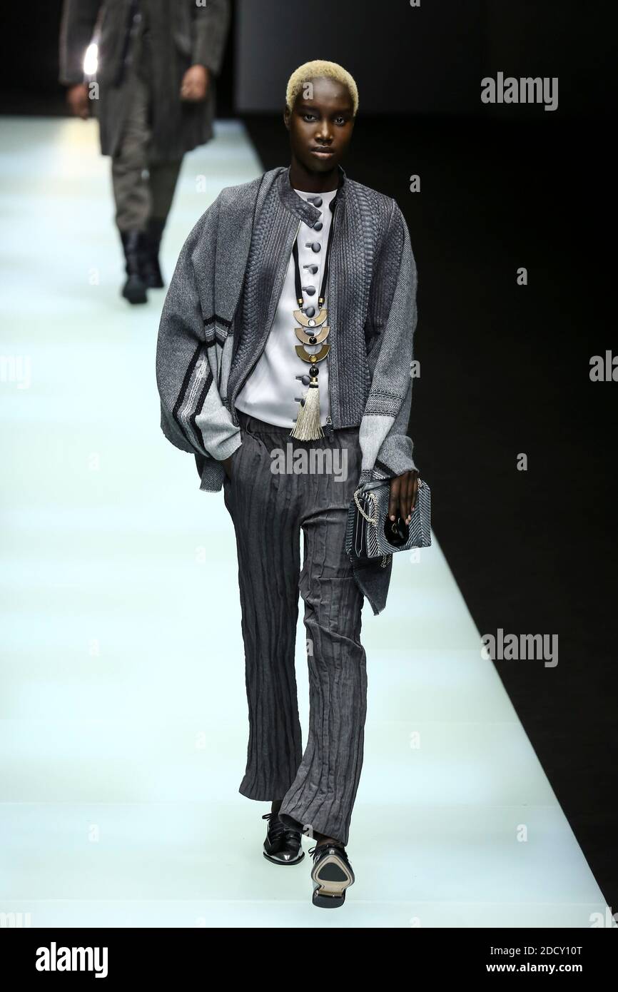 A model takes the runaway during the fashion show of Giorgio Armani ...