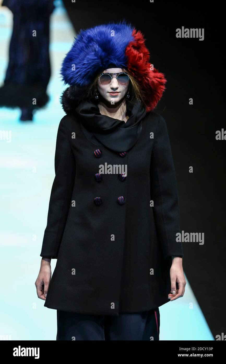 A model takes the runaway during the fashion show of Giorgio Armani ...