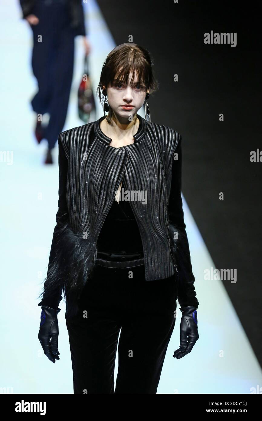 A model takes the runaway during the fashion show of Giorgio Armani ...