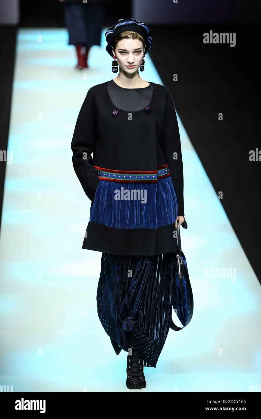 A model takes the runaway during the fashion show of Giorgio Armani ...