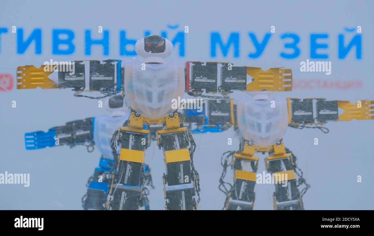 Humanoid robots dancing at robotic show Stock Photo - Alamy