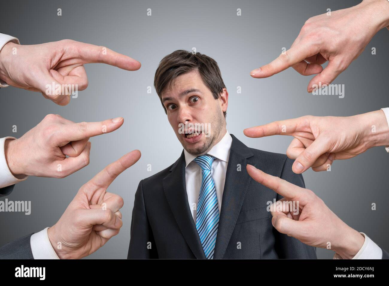 Many hands are pointing on guilty man and blame him Stock Photo - Alamy