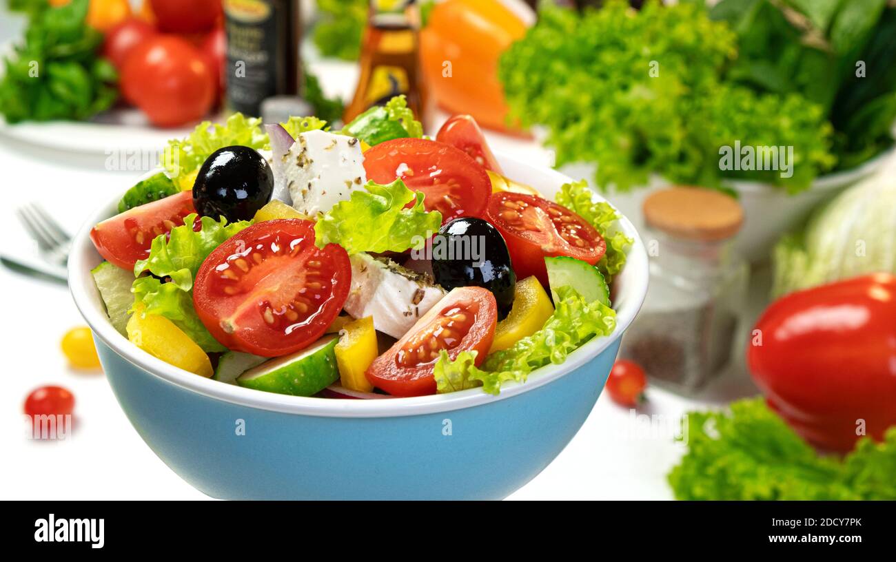 Fresh greek salad served with healthy food ingredients Stock Photo - Alamy