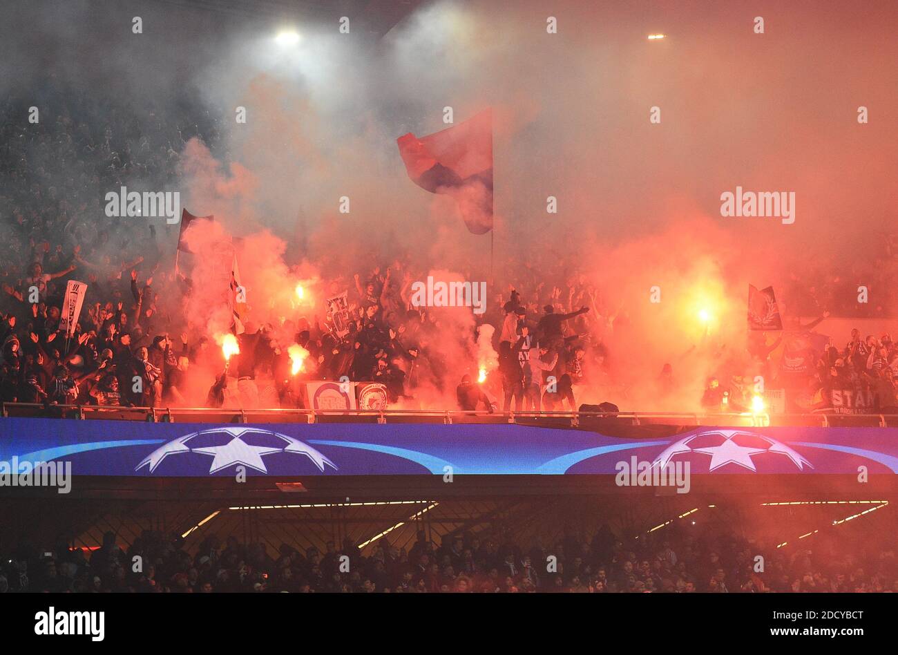 PSG's fans light flares during the UEFA Champions League Round of 16 ...