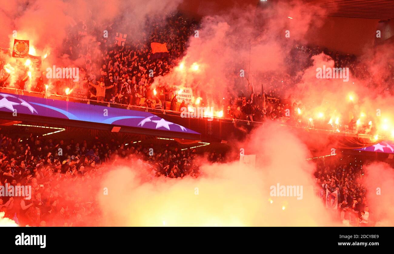 PSG's fans light flares during the UEFA Champions League Round of 16 ...