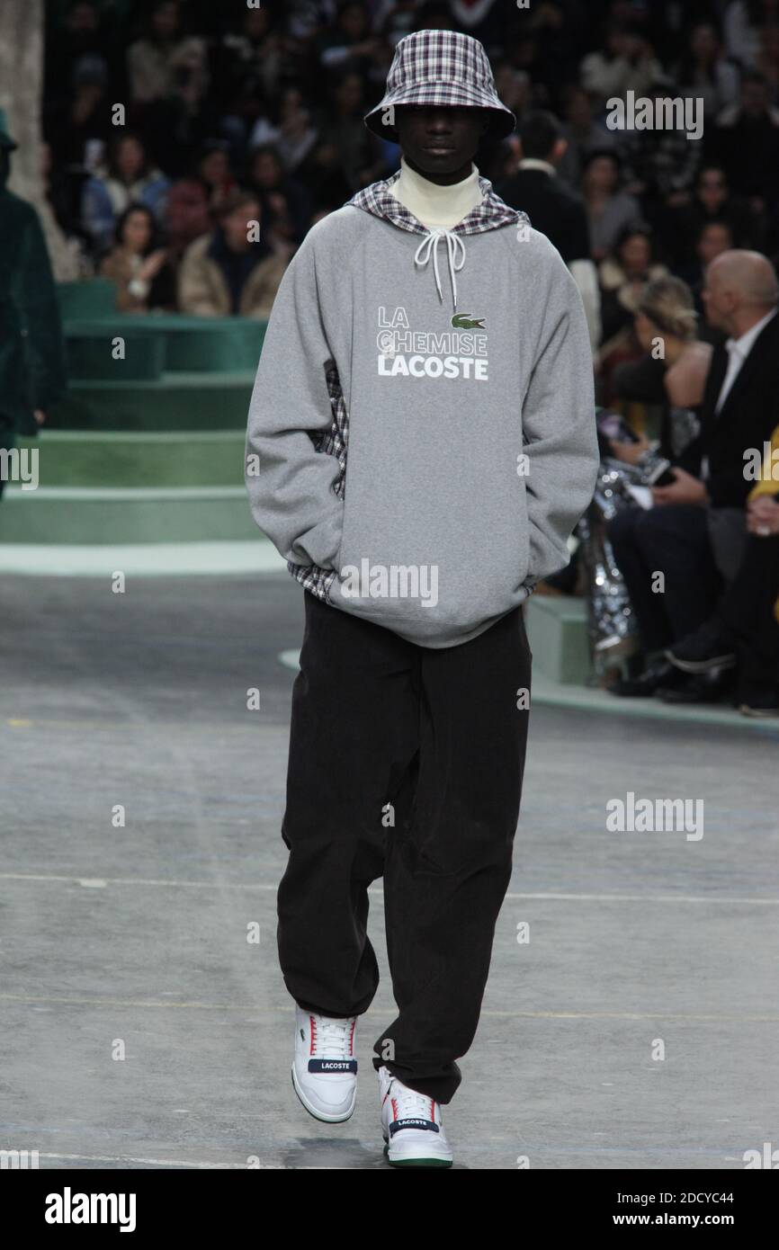 A model walks the runway during the Lacoste Womenswear Fall-Winter 2018 ...