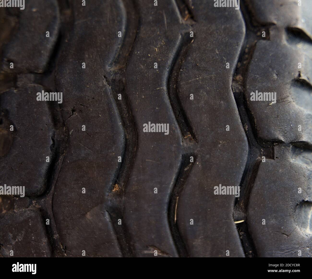 Worn old black rubber tire from a truck, close-up Stock Photo - Alamy