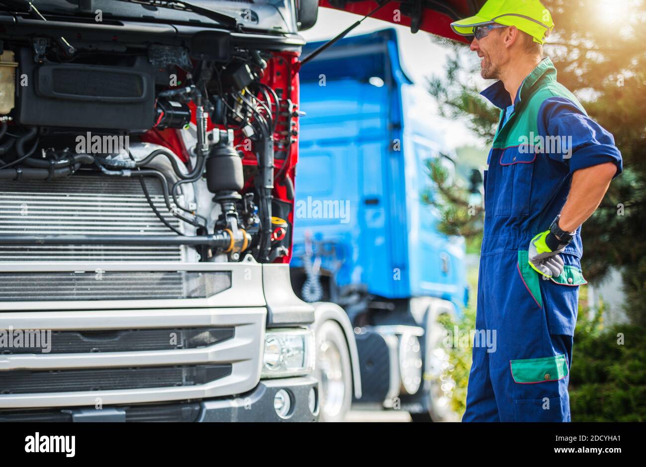 Happy Smiling Caucasian Professional Truck Mechanic in His 30s Staying ...