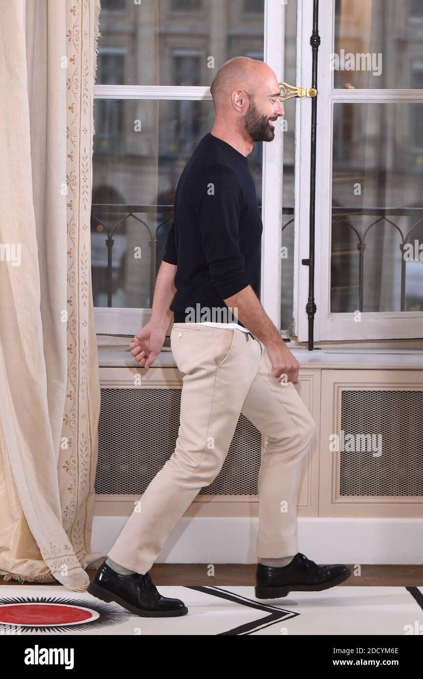 Designer Marco Zanini makes an appearance after the Schiaparelli show ...